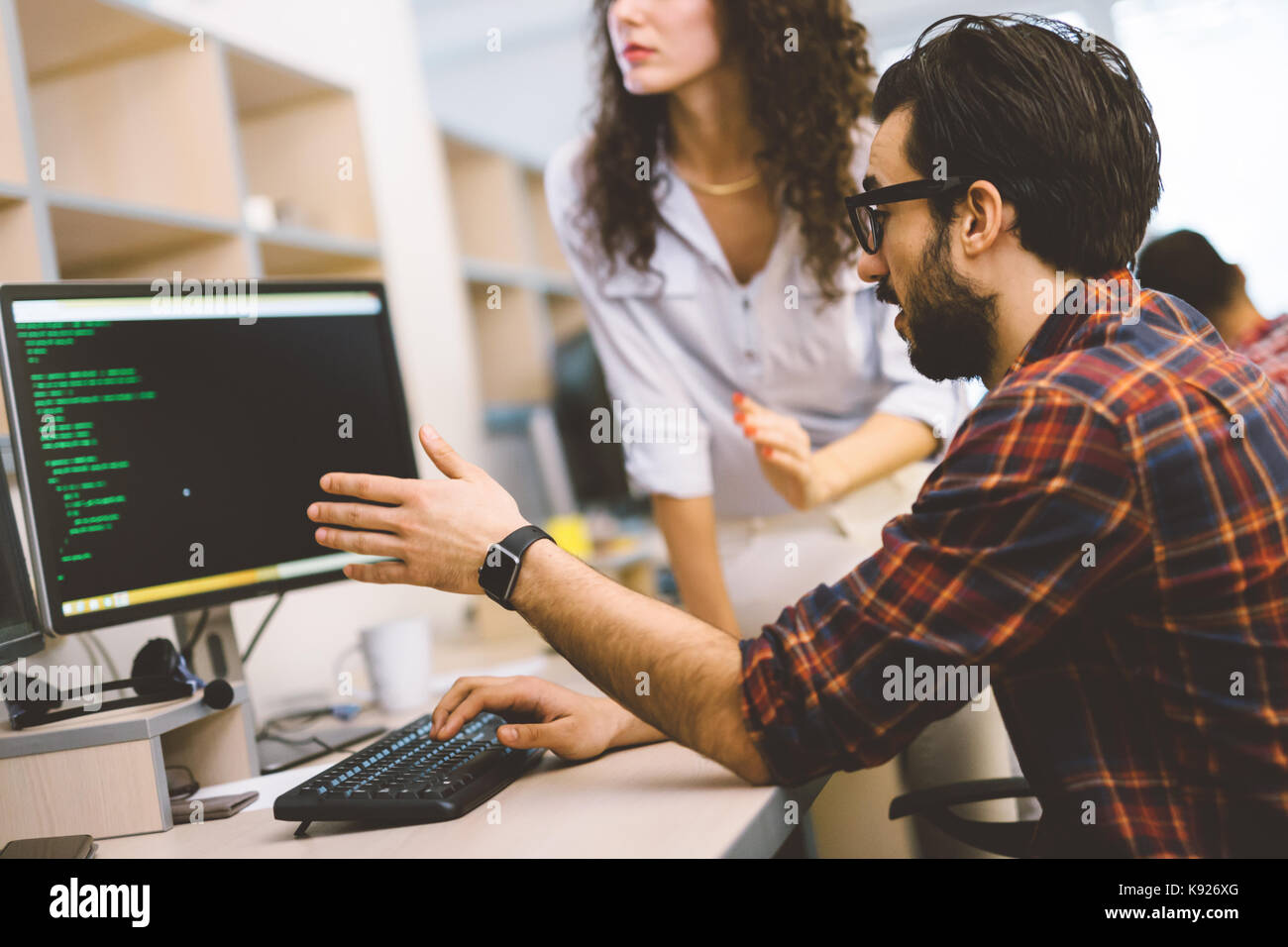 Software engineers working on project and programming in company Stock Photo - Alamy