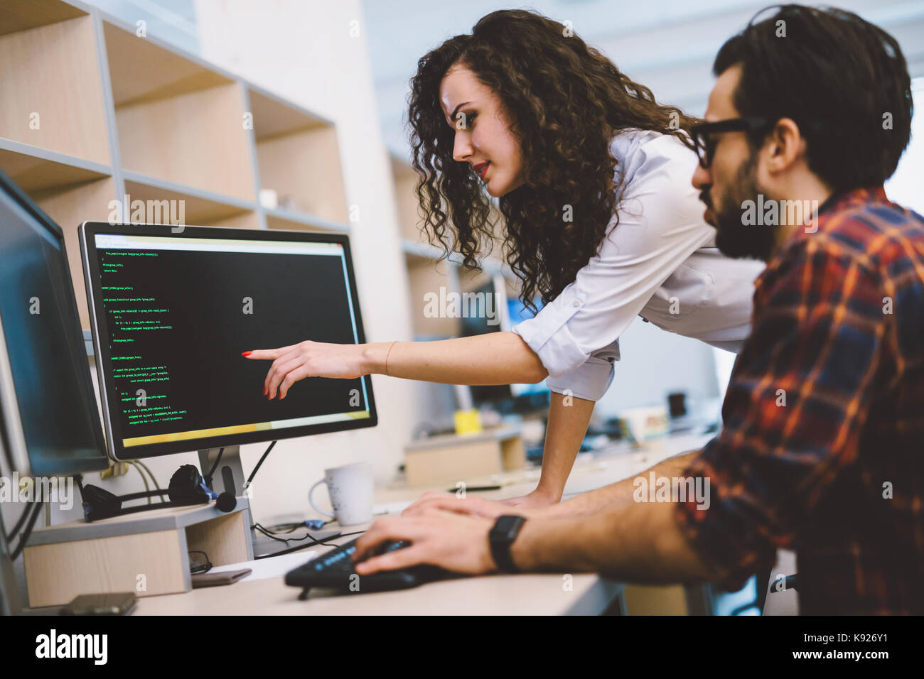 Software engineers working on project and programming in company Stock ...