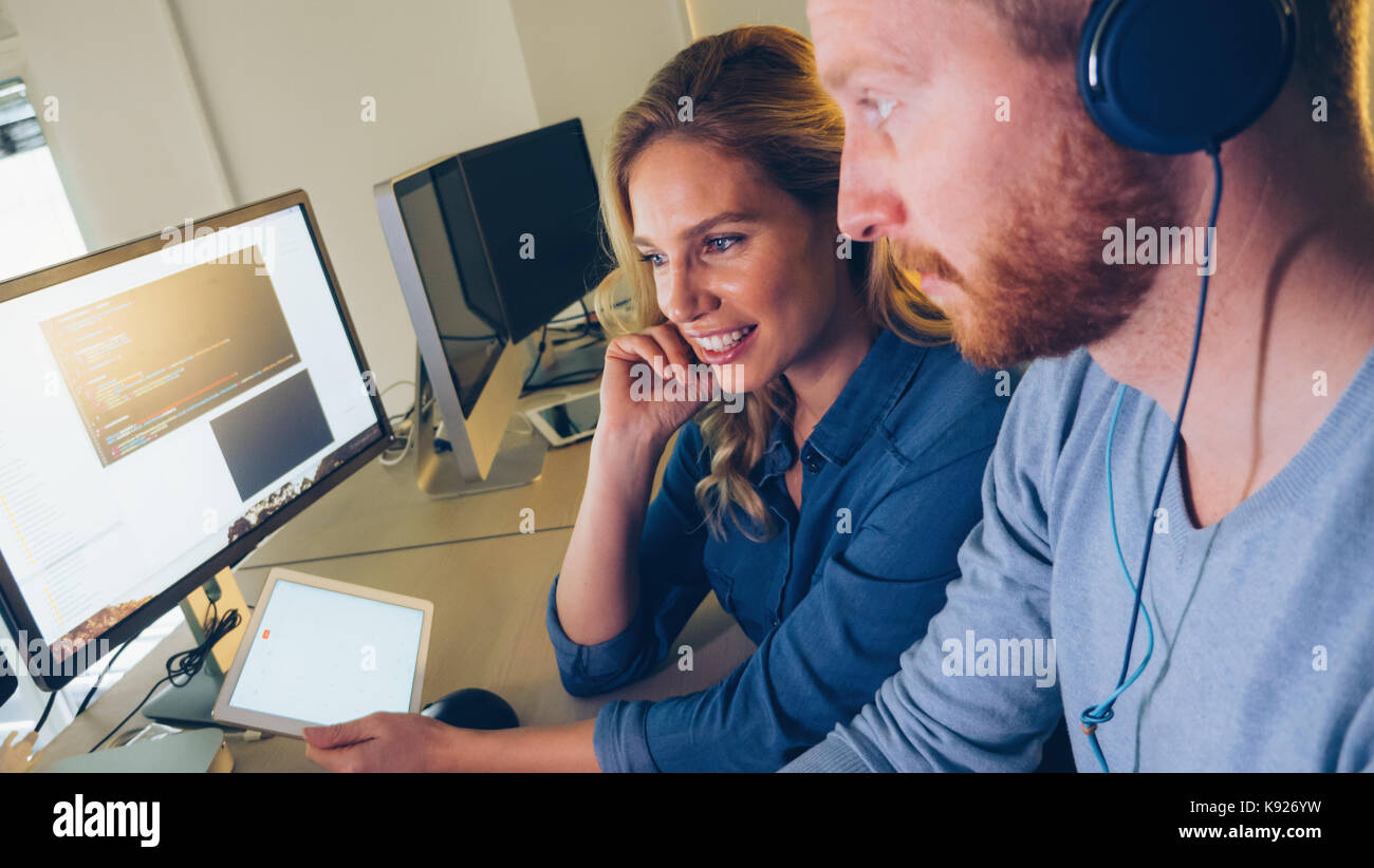 Software engineers working on project hi-res stock photography and ...