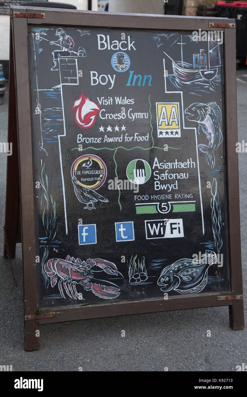 Black Boy Pub Sign, Caernarfon, Wales Stock Photo - Alamy