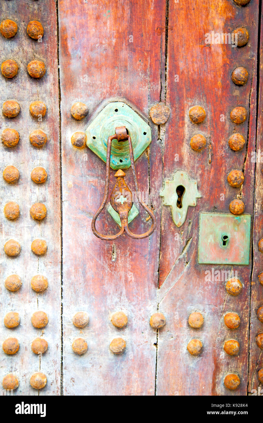 brown morocco in africa the old wood facade home and rusty safe padlock ...
