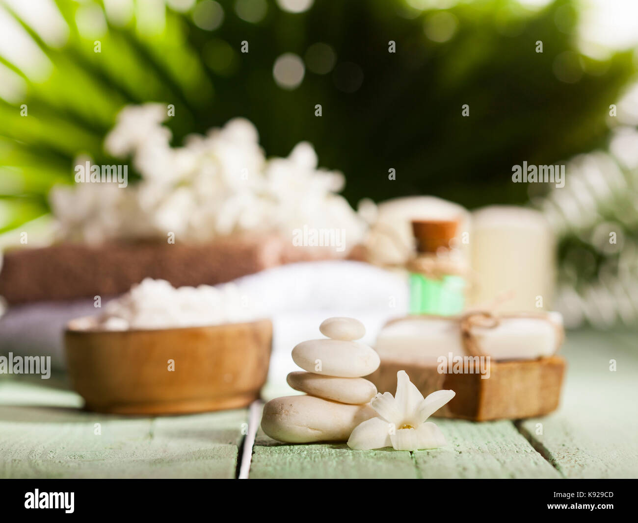 Spa background in the range of white and green. Green leaves background ...
