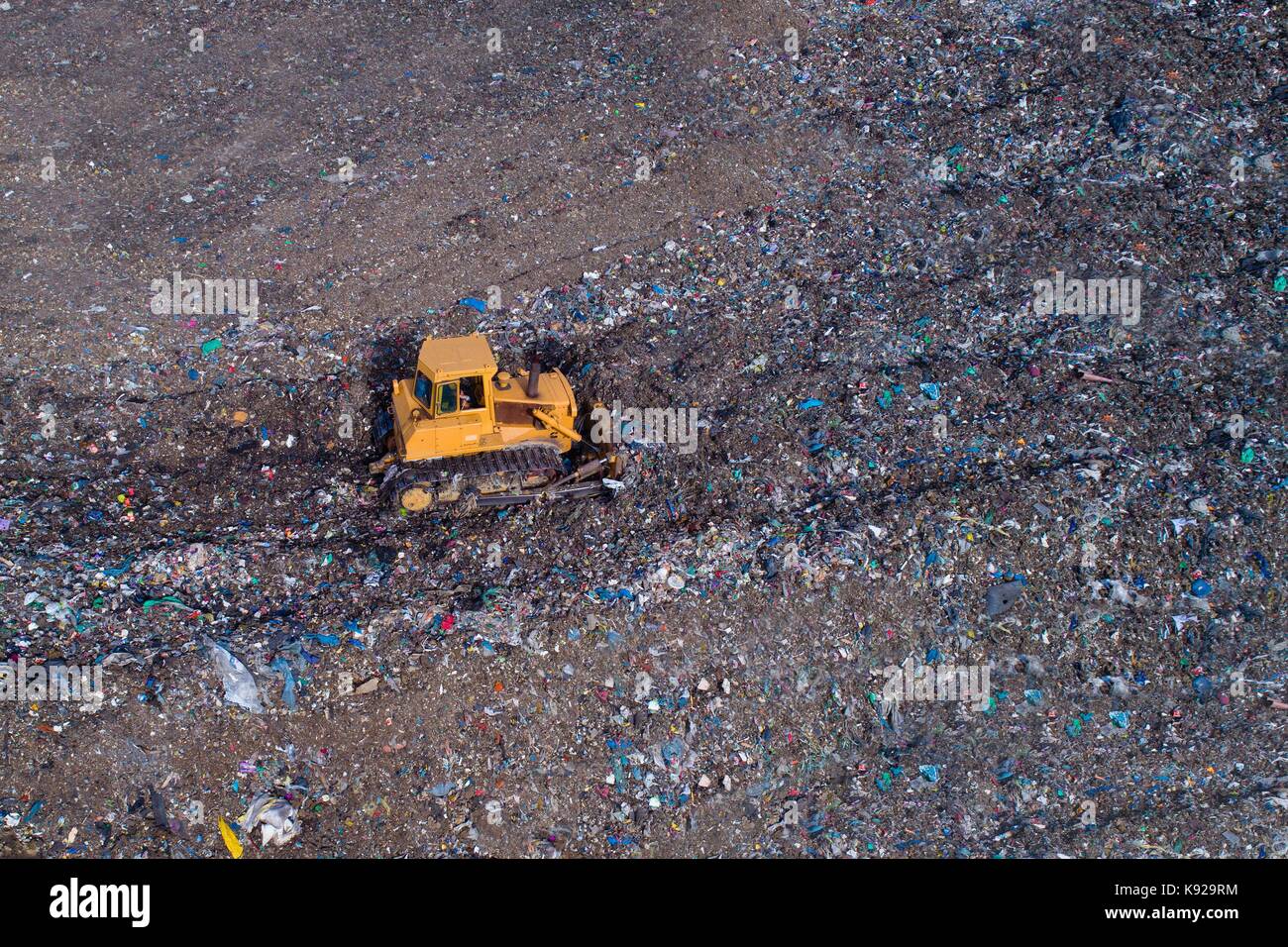 Bulldozer working on landfill site hi-res stock photography and images ...