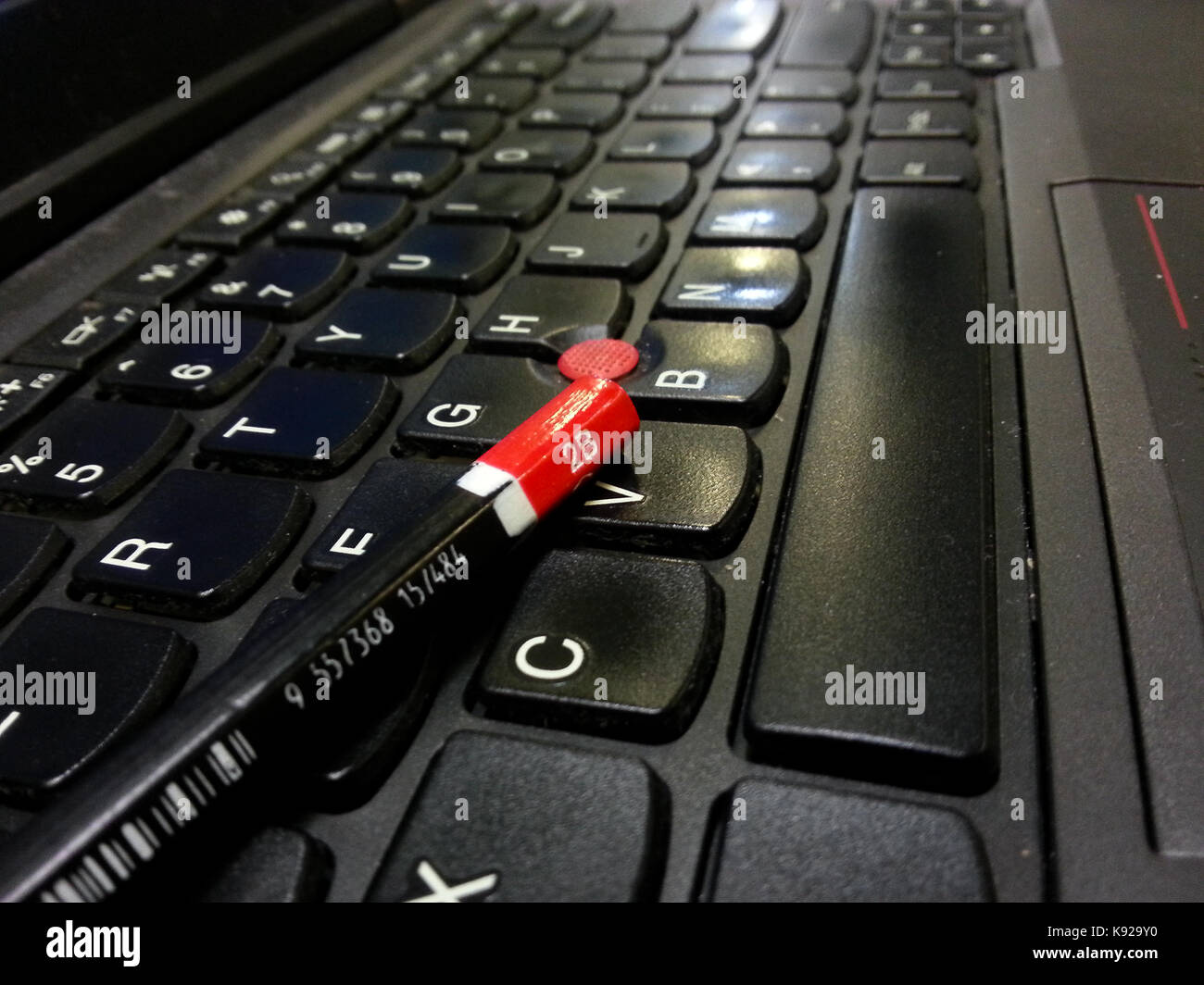 keyboard and pencil; technology evolve to make words Stock Photo - Alamy