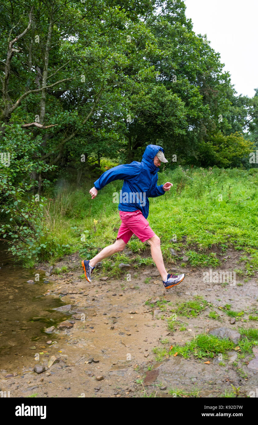 Running in the north English countryside in the rain Stock Photo - Alamy