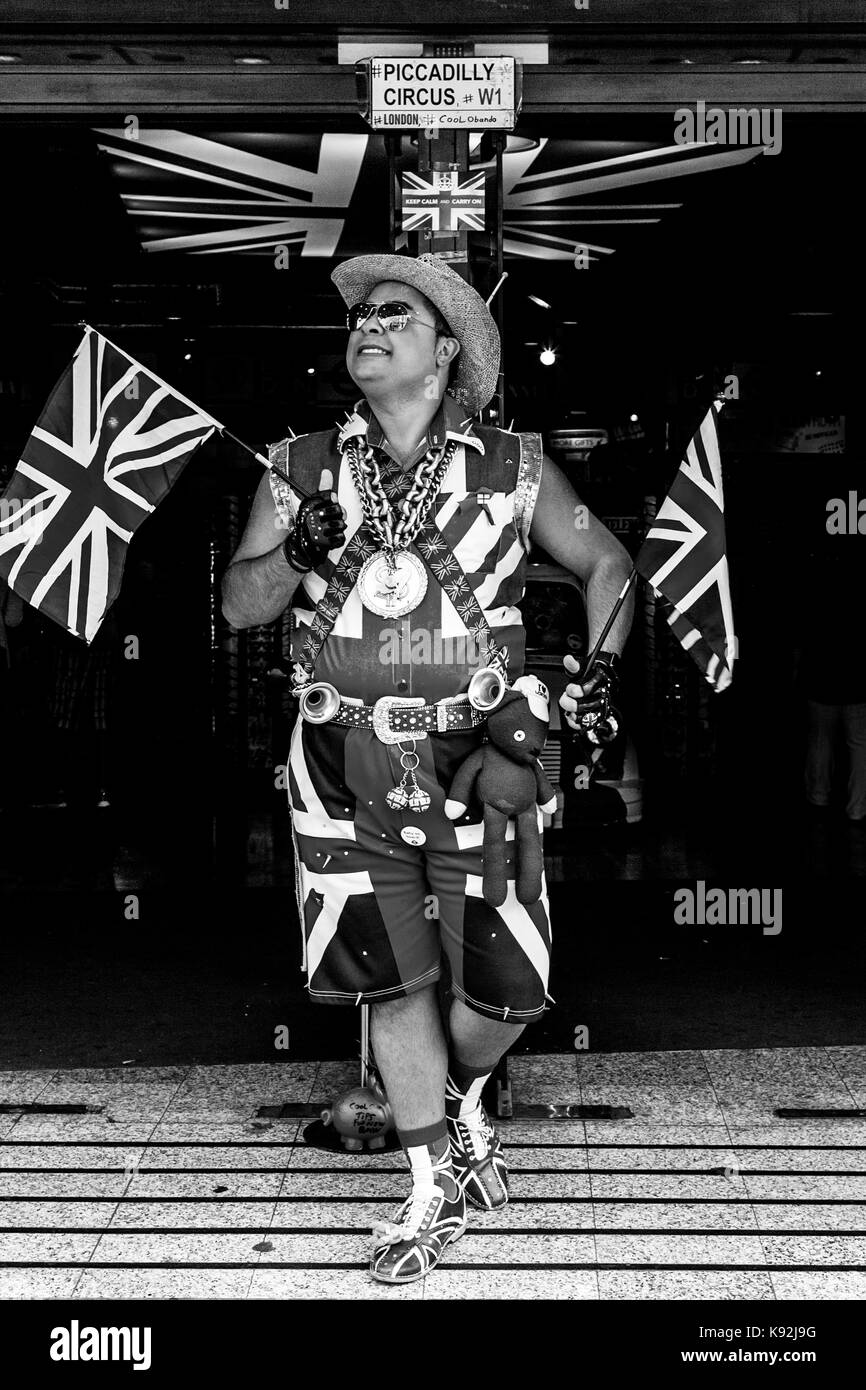 A Man In A Union Jack Costume Attracts Customers Into The Cool ...