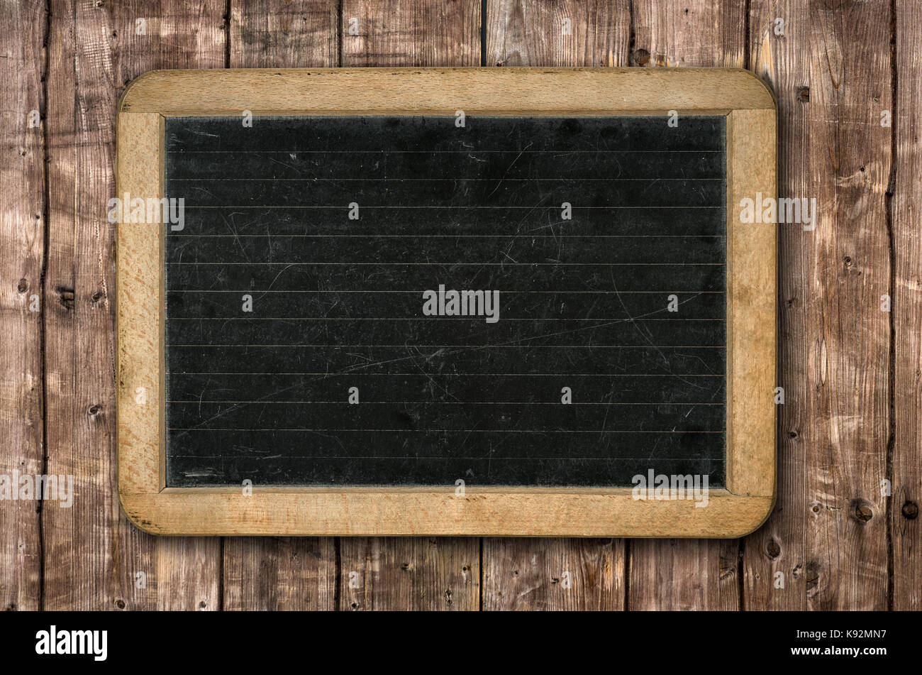 Old chalkboard on rustic wooden background Stock Photo - Alamy