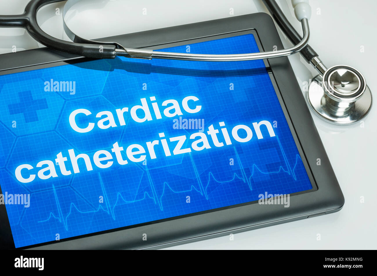 Tablet with the text Cardiac catheterization on the display Stock Photo ...