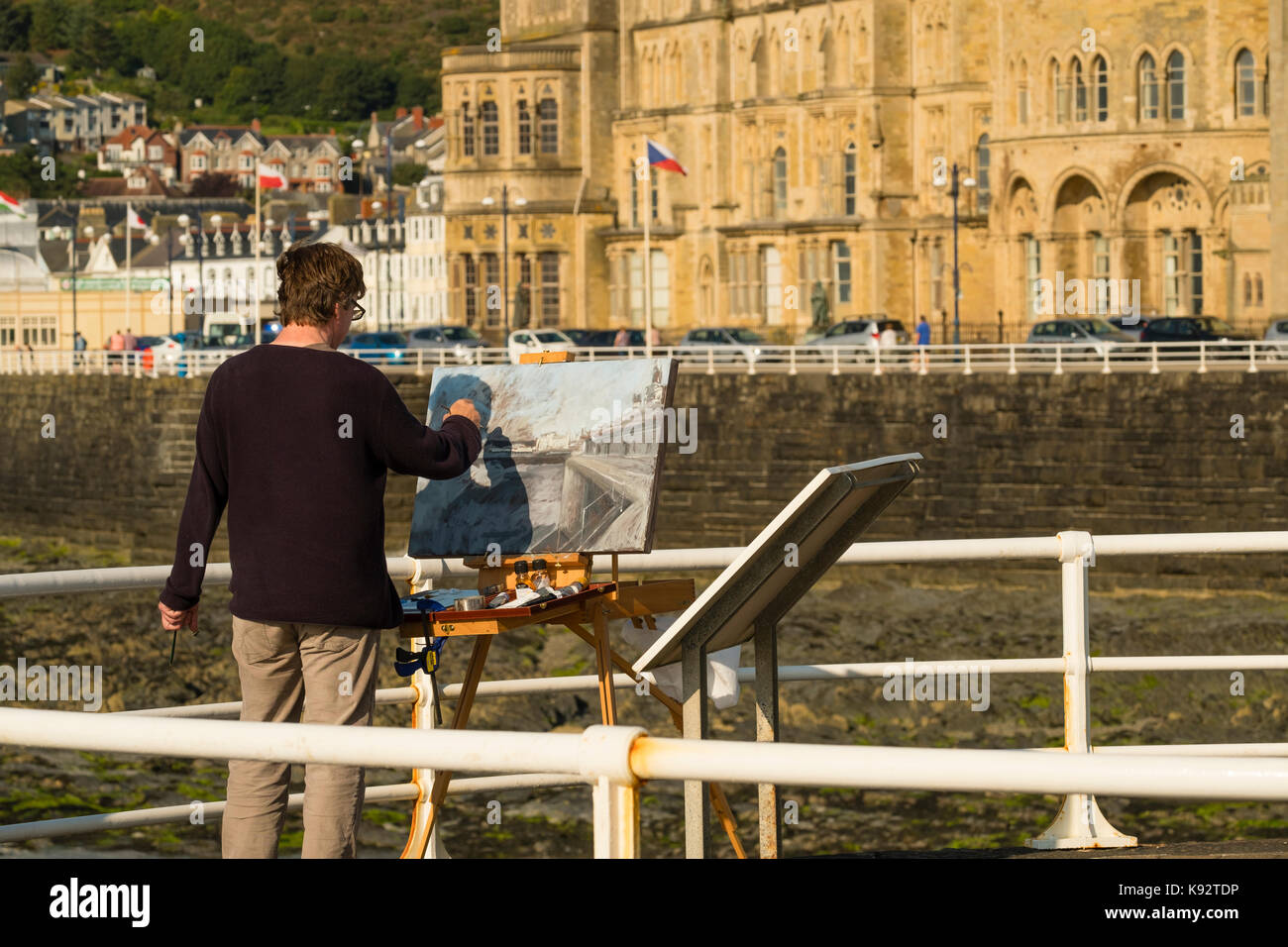 Welsh visual artist , Owain Gwent, painting a view of Aberystwyth ...