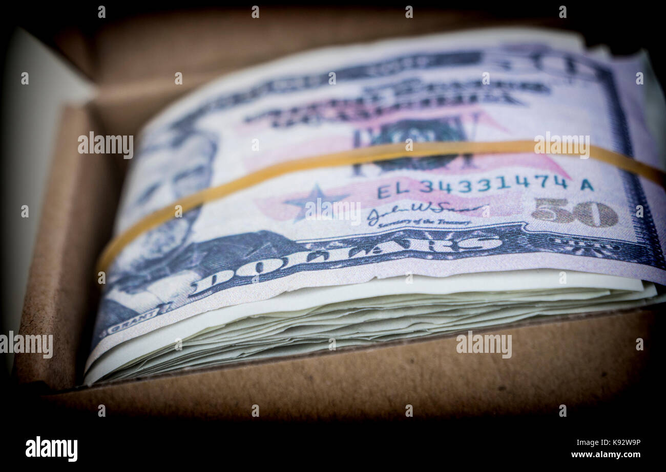 Block of tickets for 50 dollars in the box Stock Photo - Alamy