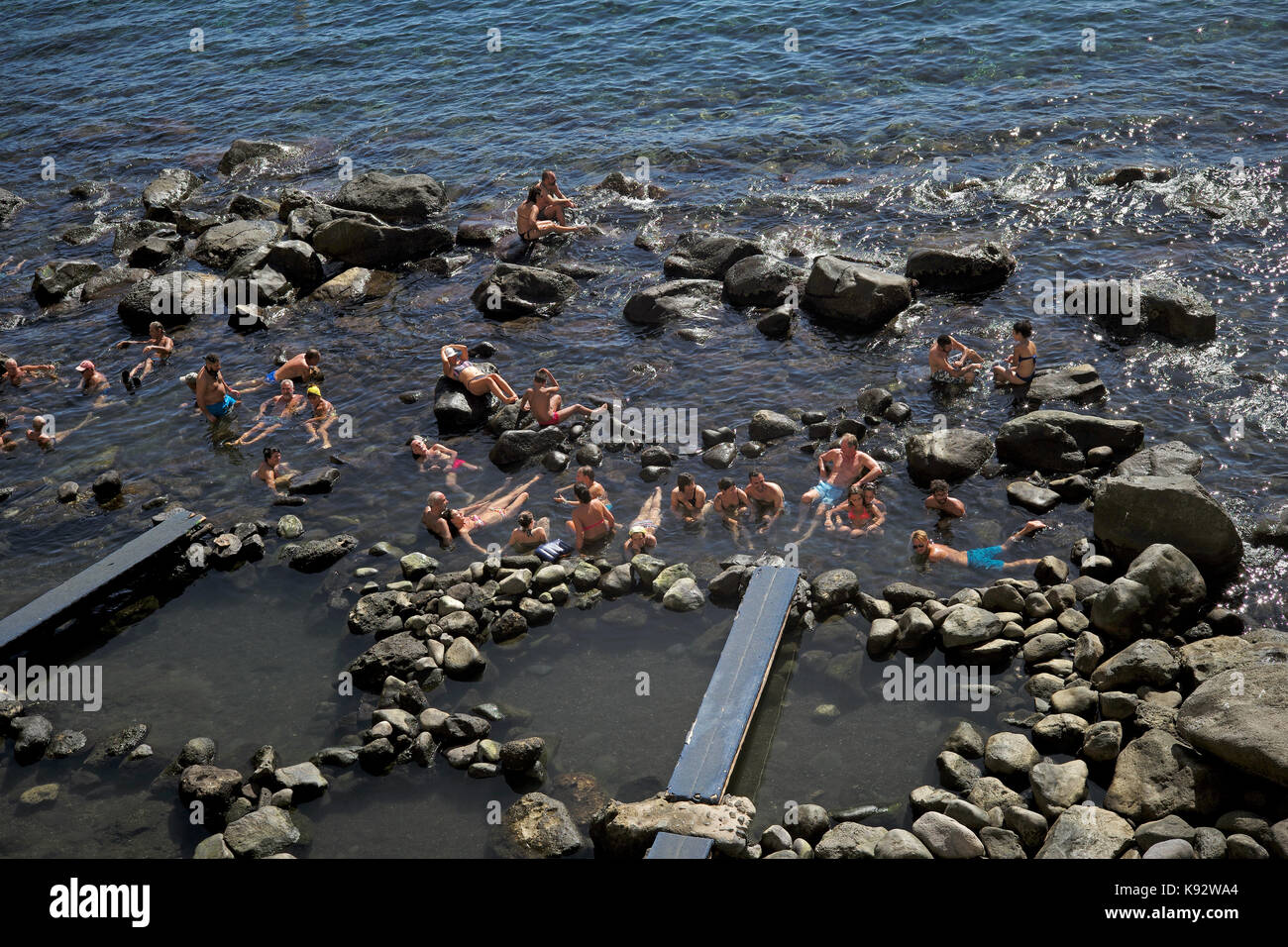Sorgeto Bay on the rocky south coast of the Island of Ischia, Italy ...