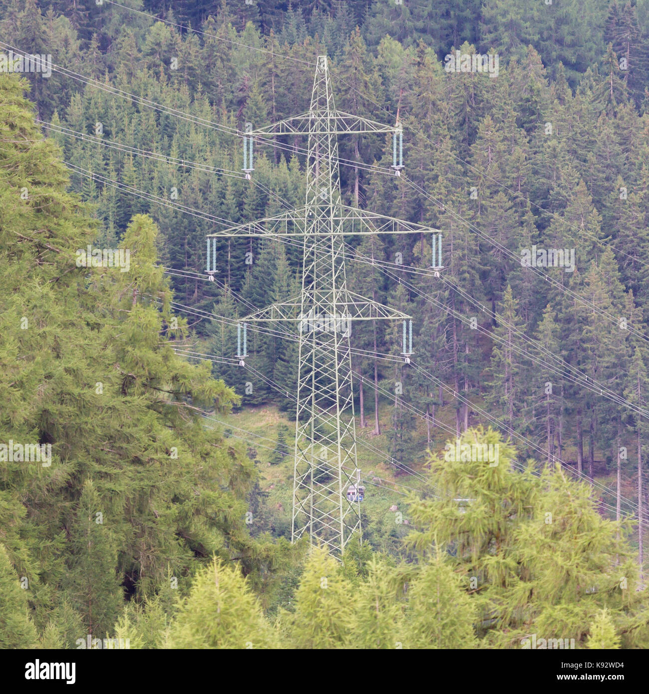 Large electric pylon in the Alps - Austria Stock Photo - Alamy