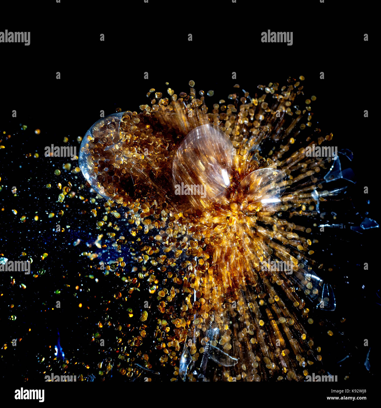 closeup on real explosion with black background Stock Photo - Alamy