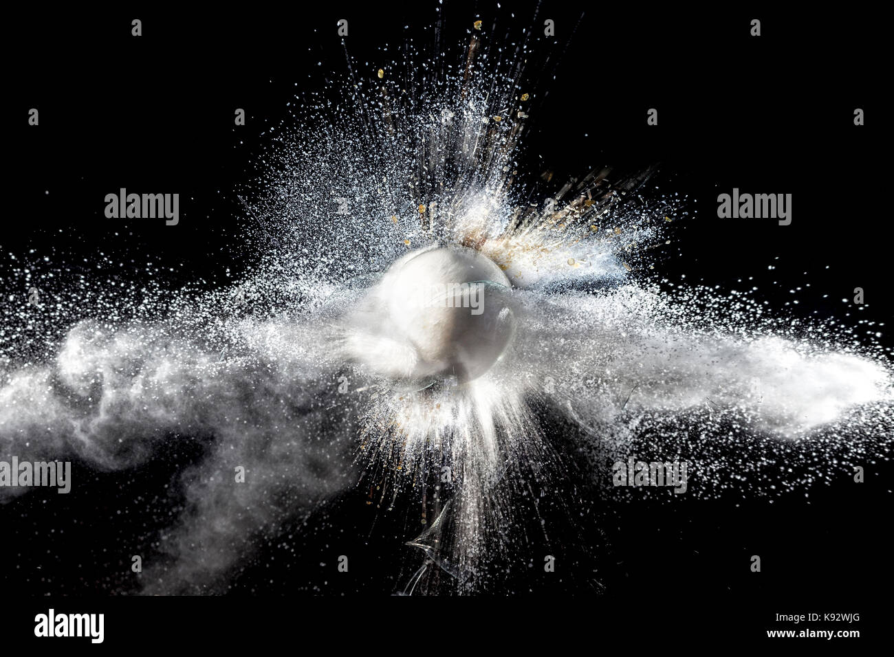 closeup on real explosion with black background Stock Photo - Alamy