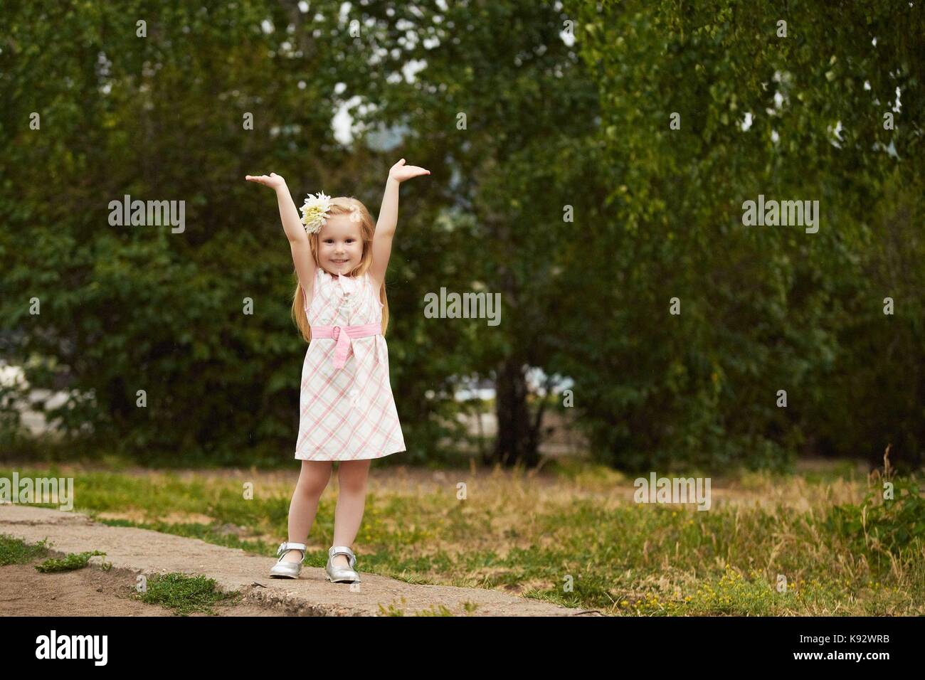 Happy child. Girl. Walk Stock Photo - Alamy