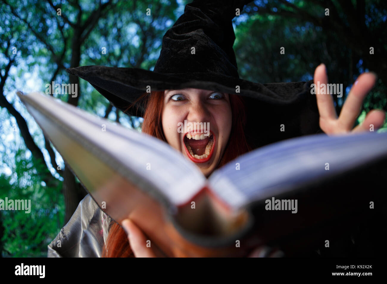 Close-up photo of screaming witch Stock Photo - Alamy