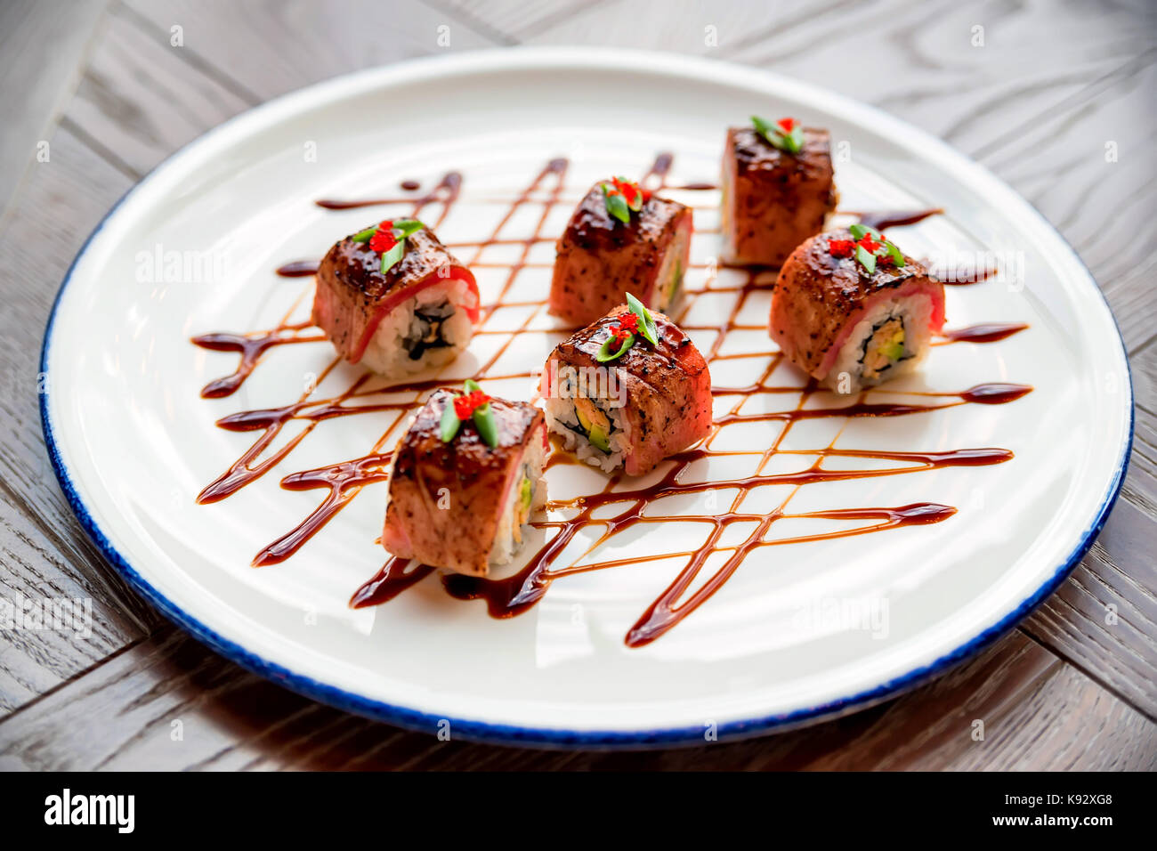 Traditional japanese sushi rolls in restaurant Stock Photo - Alamy