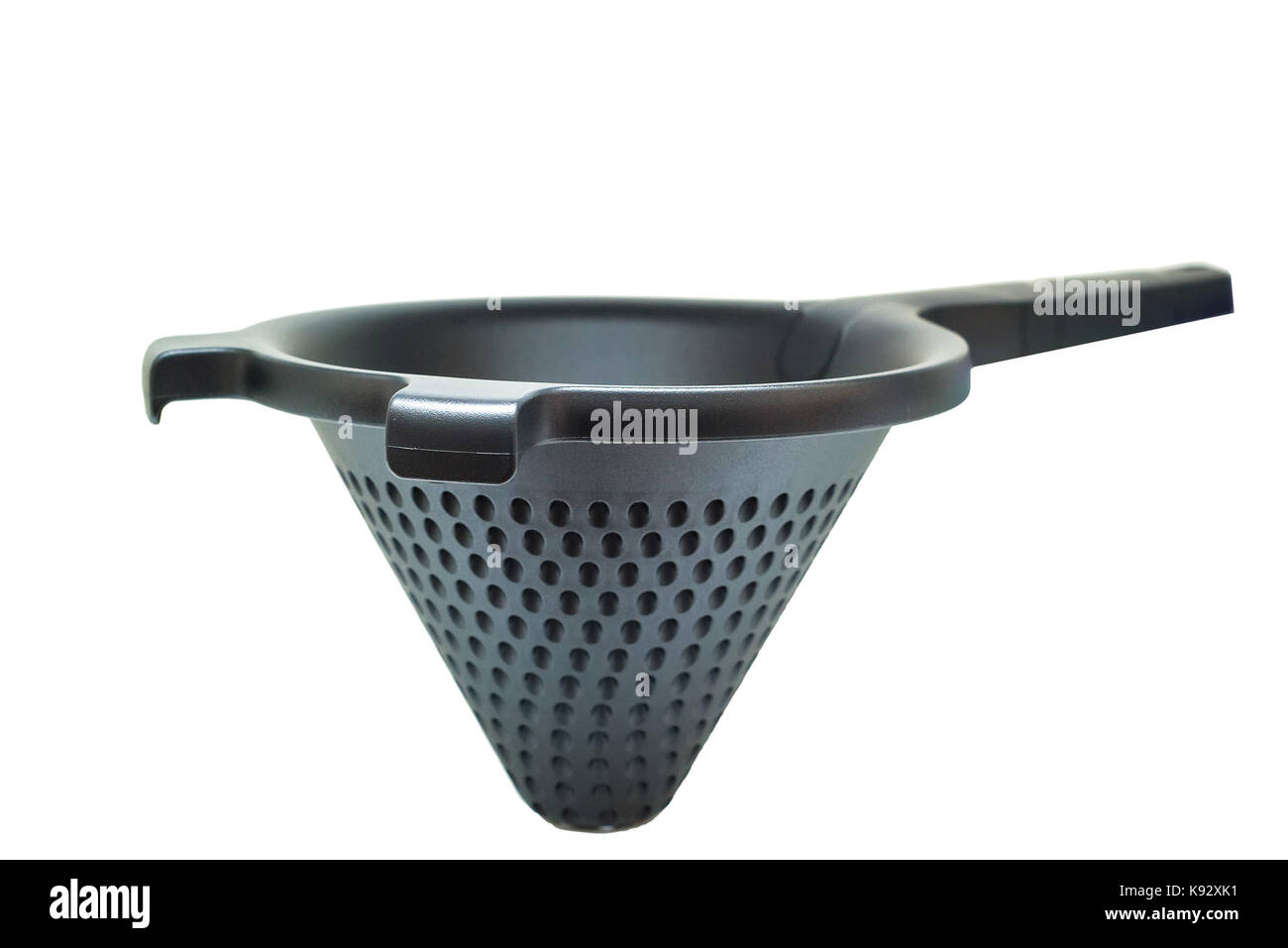 Close up modern plastic cone sieve isolated Stock Photo - Alamy