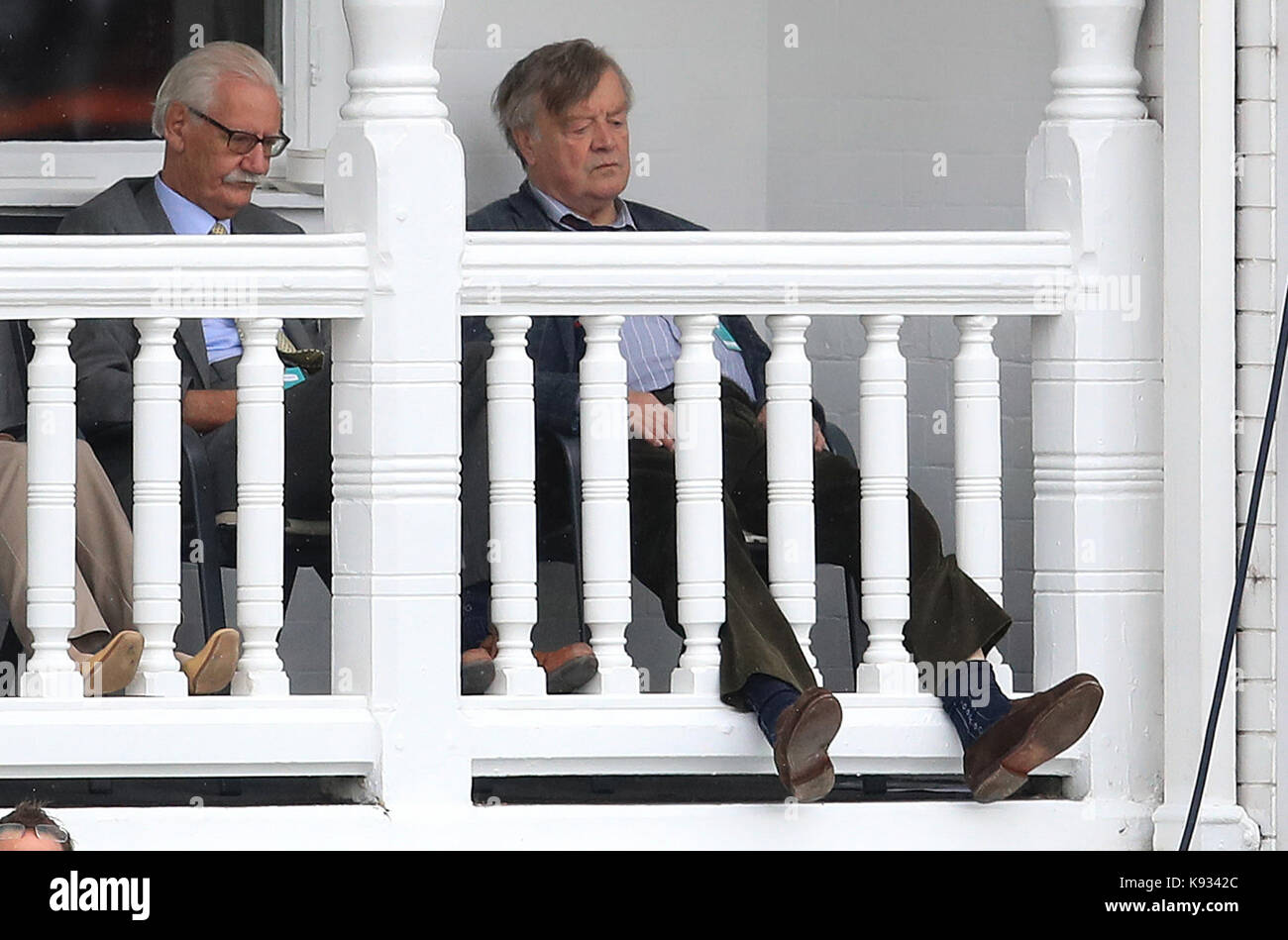 Conservative politician Ken Clarke relaxes as rain stops play during ...