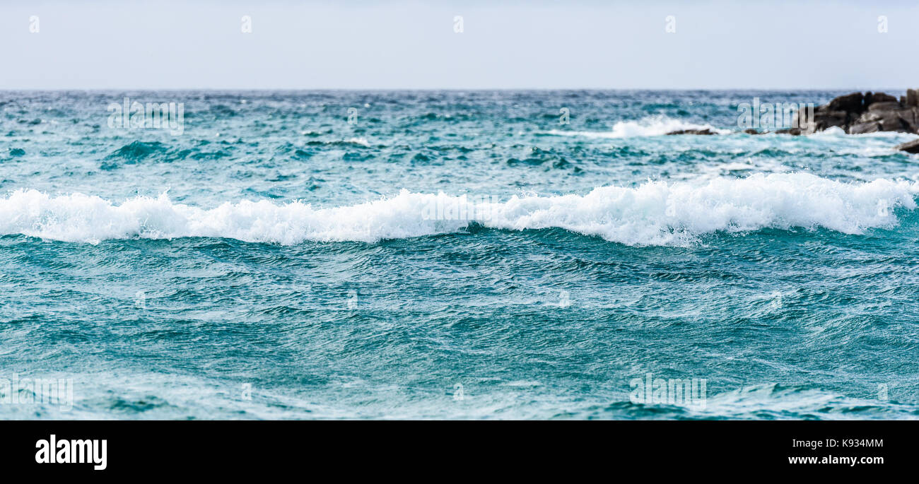 Strong wind, sea waves and the coast or beach. Dramatic photo of ...
