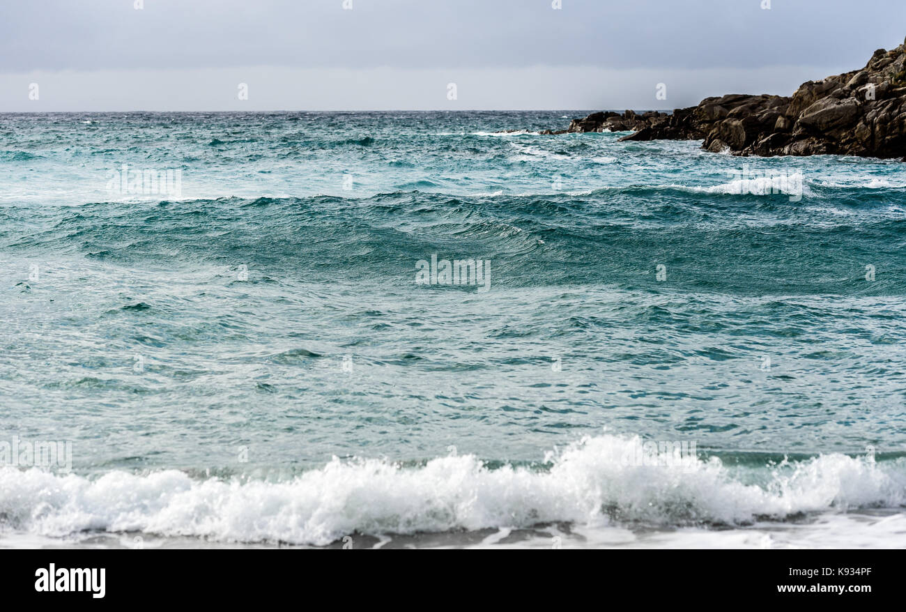 Strong wind, sea waves and the coast or beach. Dramatic photo of ...