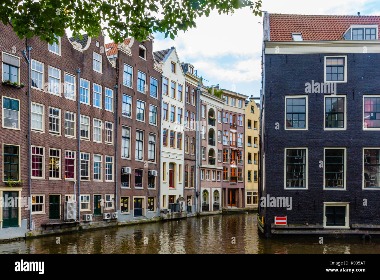 Canalside buildings in Amsterdam Stock Photo - Alamy