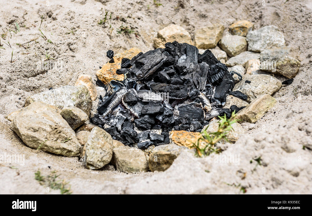 Homemade improvised BBQ barbecue grill on sandy beach on vacation ...
