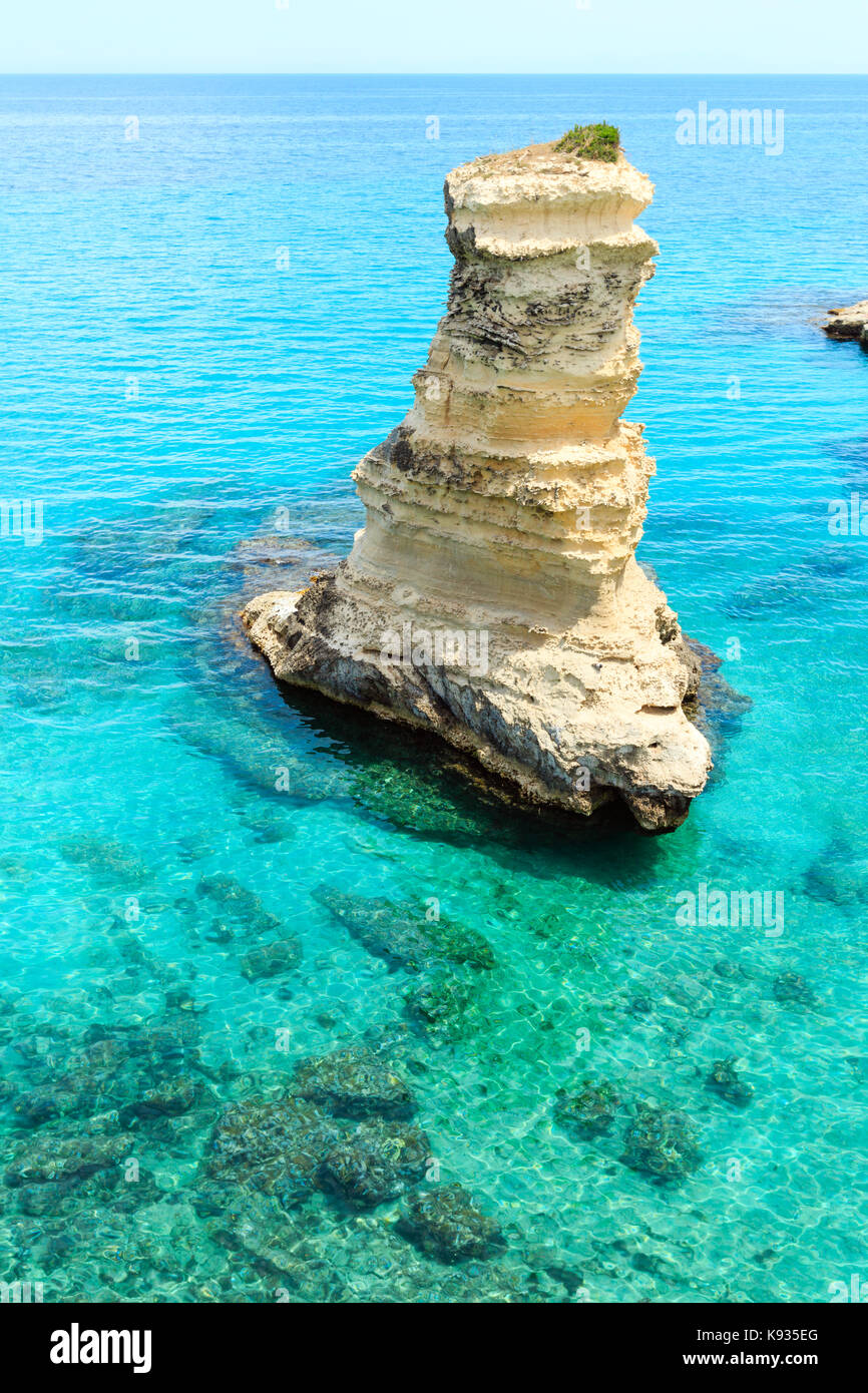 Picturesque seascape with rocky stack (faraglioni), at Torre Sant ...
