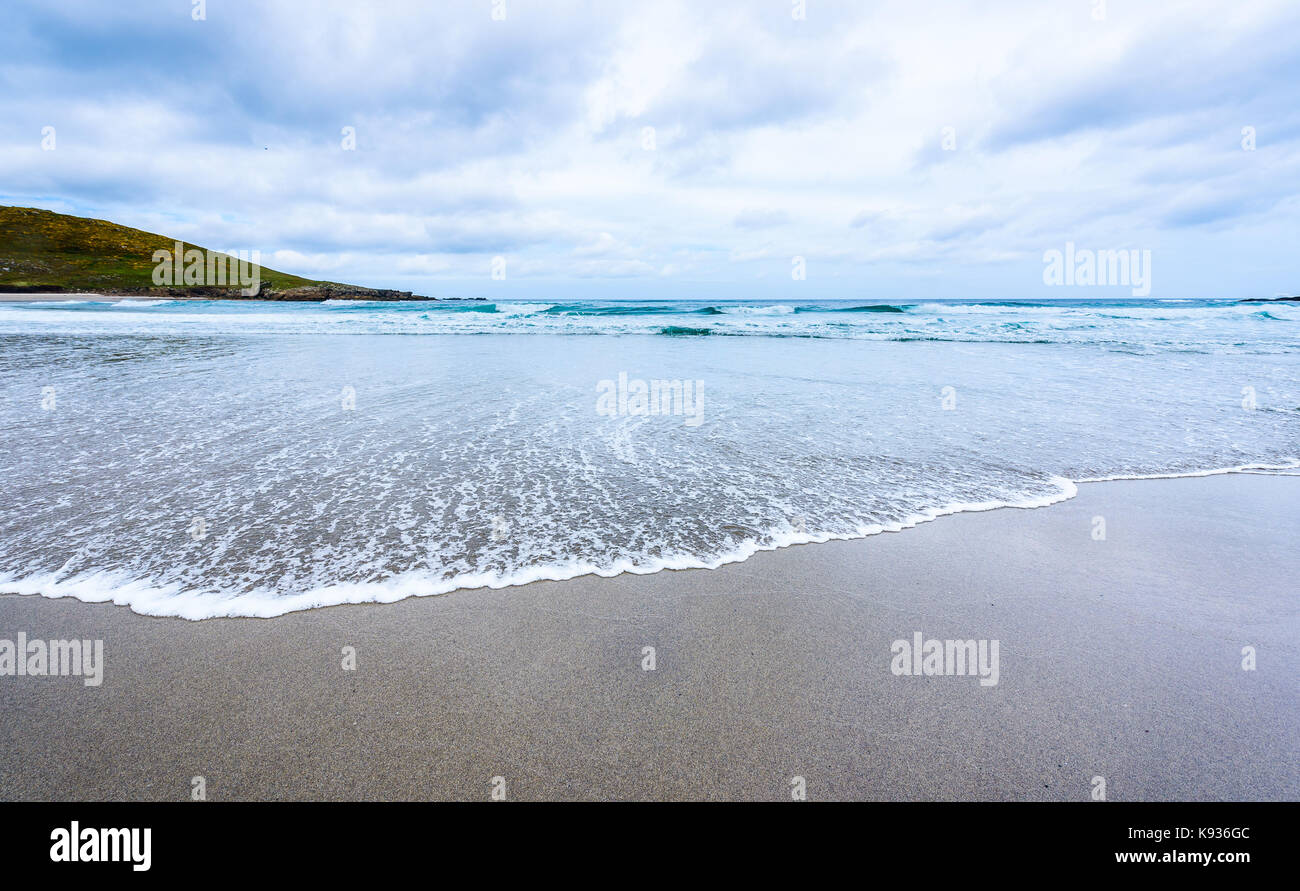 Small ocean sea waves on sandy beach in calm weather. Background ...