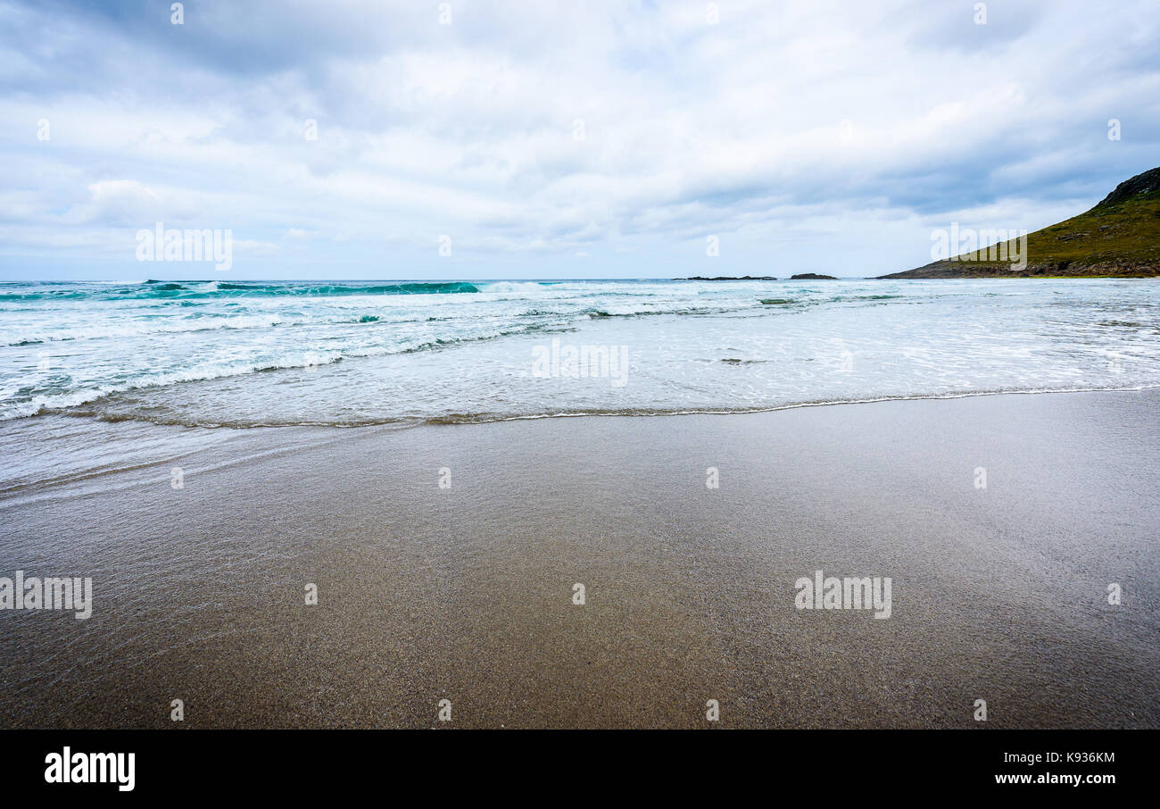 Small ocean sea waves on sandy beach in calm weather. Background ...