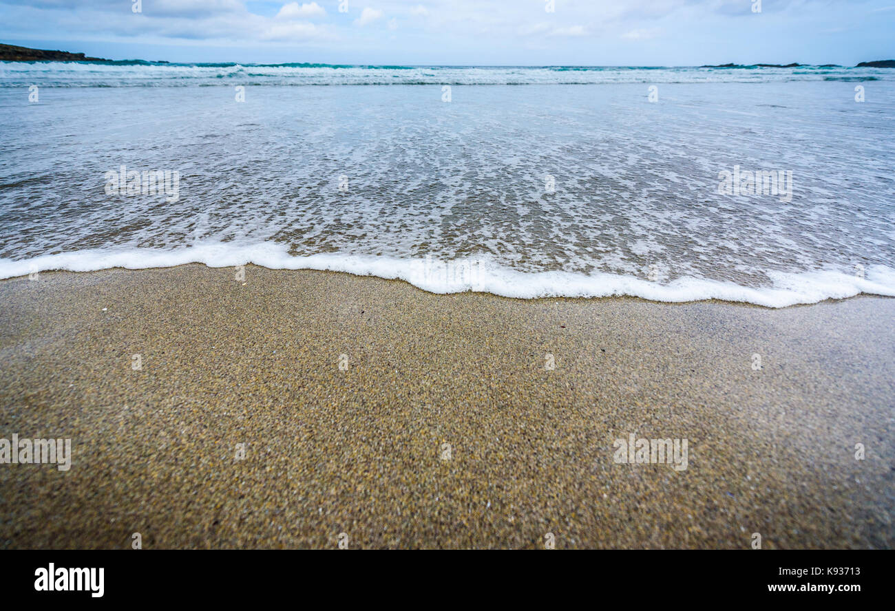 Small ocean sea waves on sandy beach in calm weather. Background ...