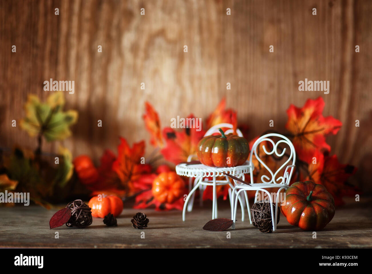 fresh pumpkin in interior wooden room on chair Stock Photo - Alamy