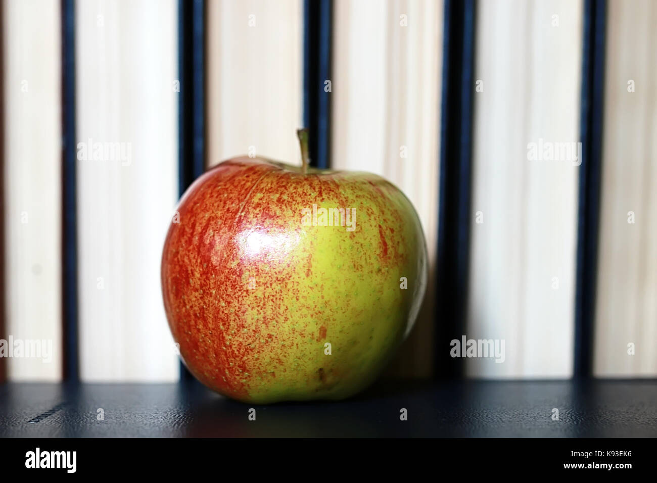 grunge effect photo education book stack apple pen Stock Photo - Alamy