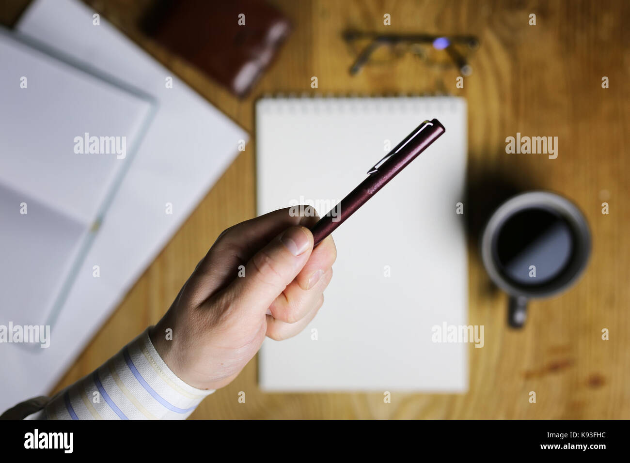 table write hand office view Stock Photo - Alamy