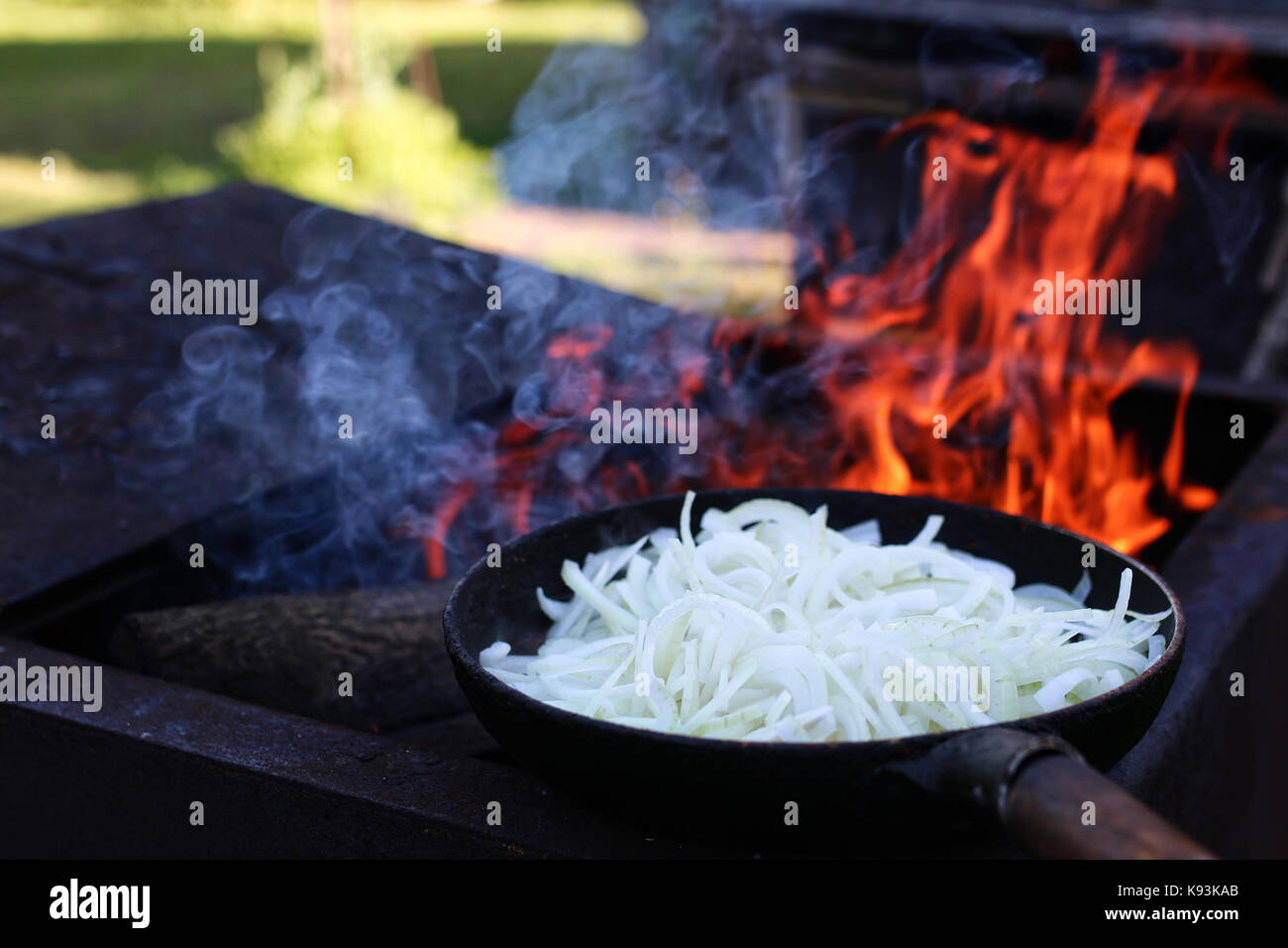 onion fry on fire outdoors Stock Photo - Alamy