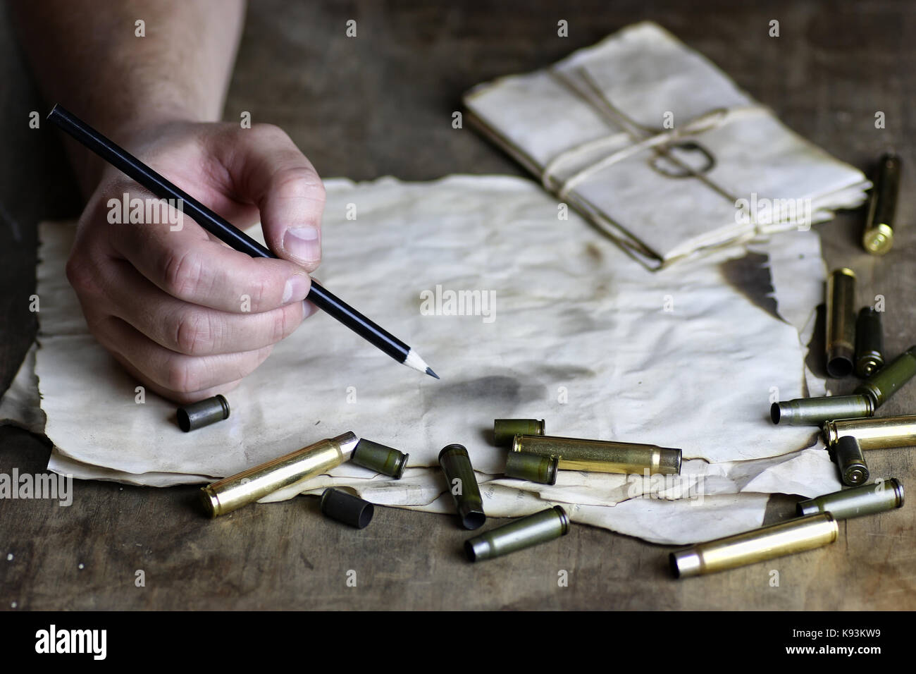 man write letter retro bullet on the table Stock Photo - Alamy