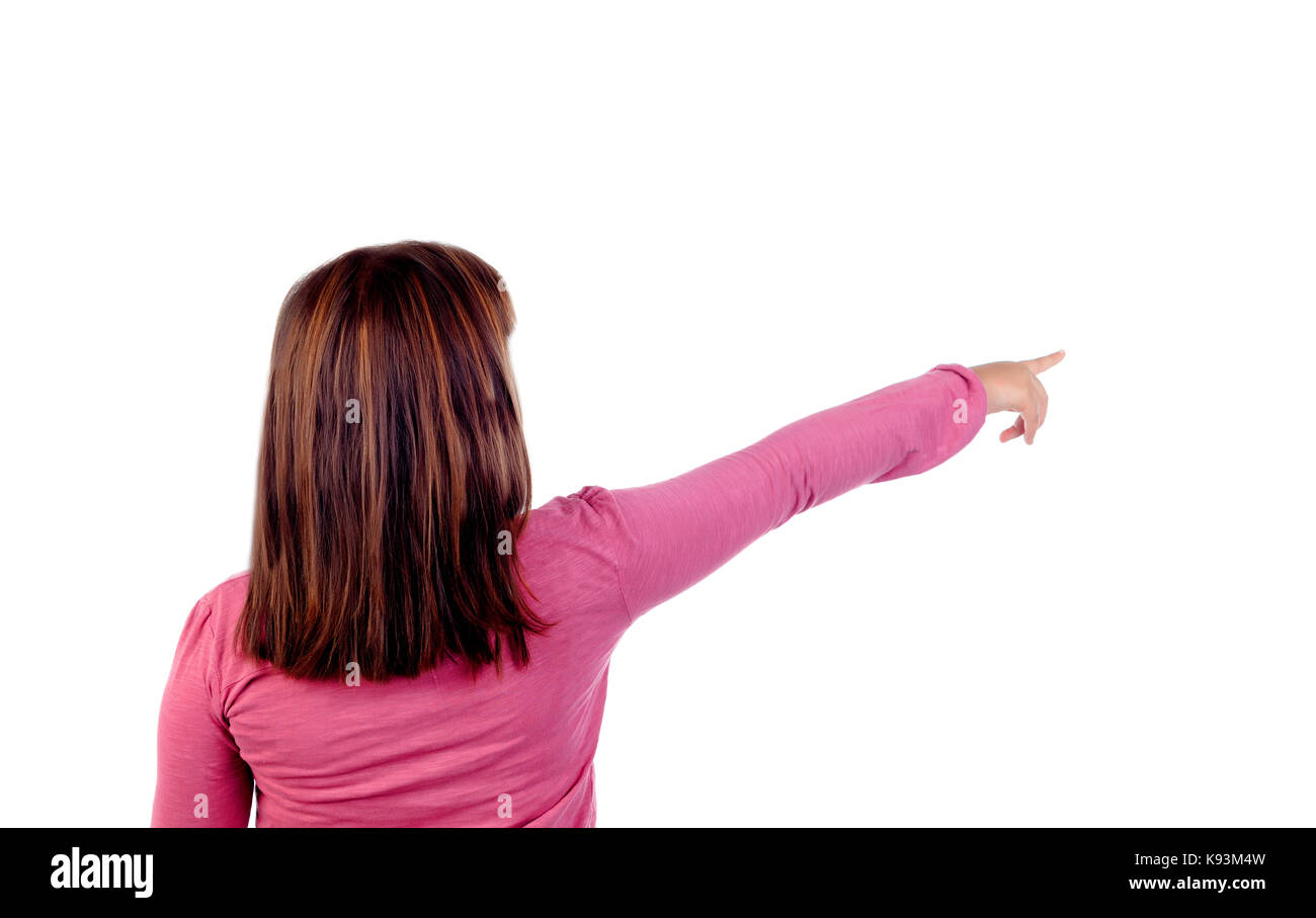 Beautiful girl indicating with his finger isolated on a white ...