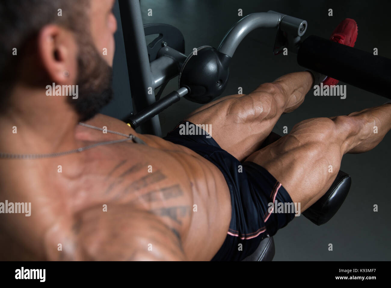 Man Doing Leg With Machine In Gym - Leg Exercises Stock Photo - Alamy