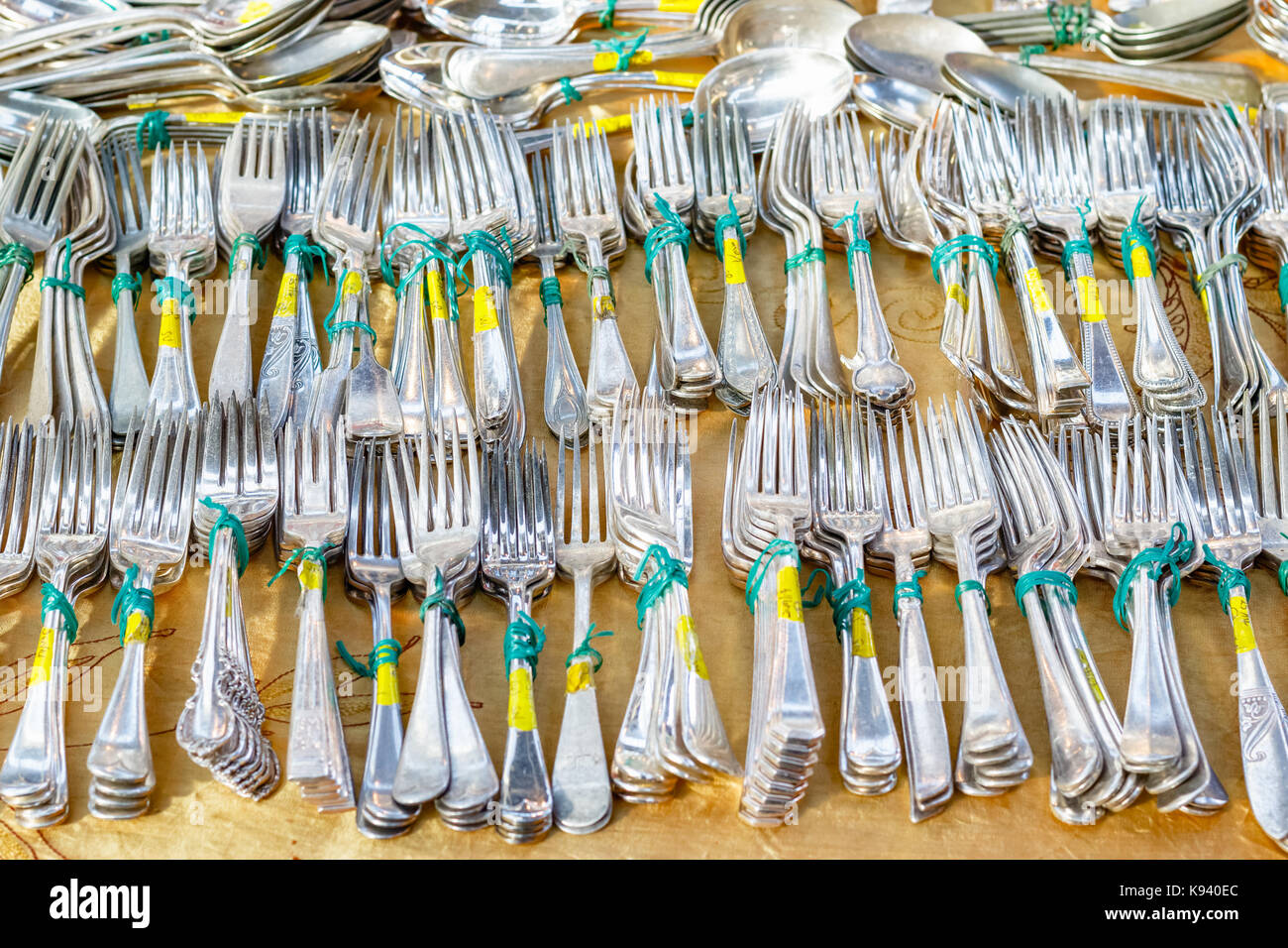 Antique silver cutlery on display at Old Spitalfields Market in London ...