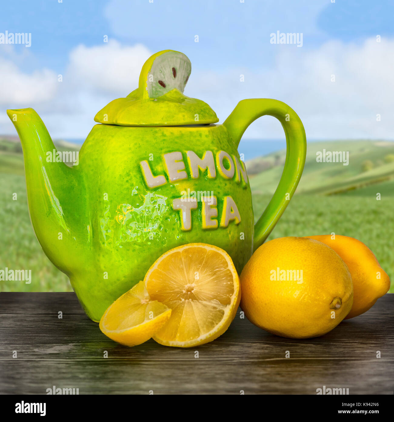 'Lemon Tea' Teapot with Fresh Lemans Against a Countryside and Sea View ...