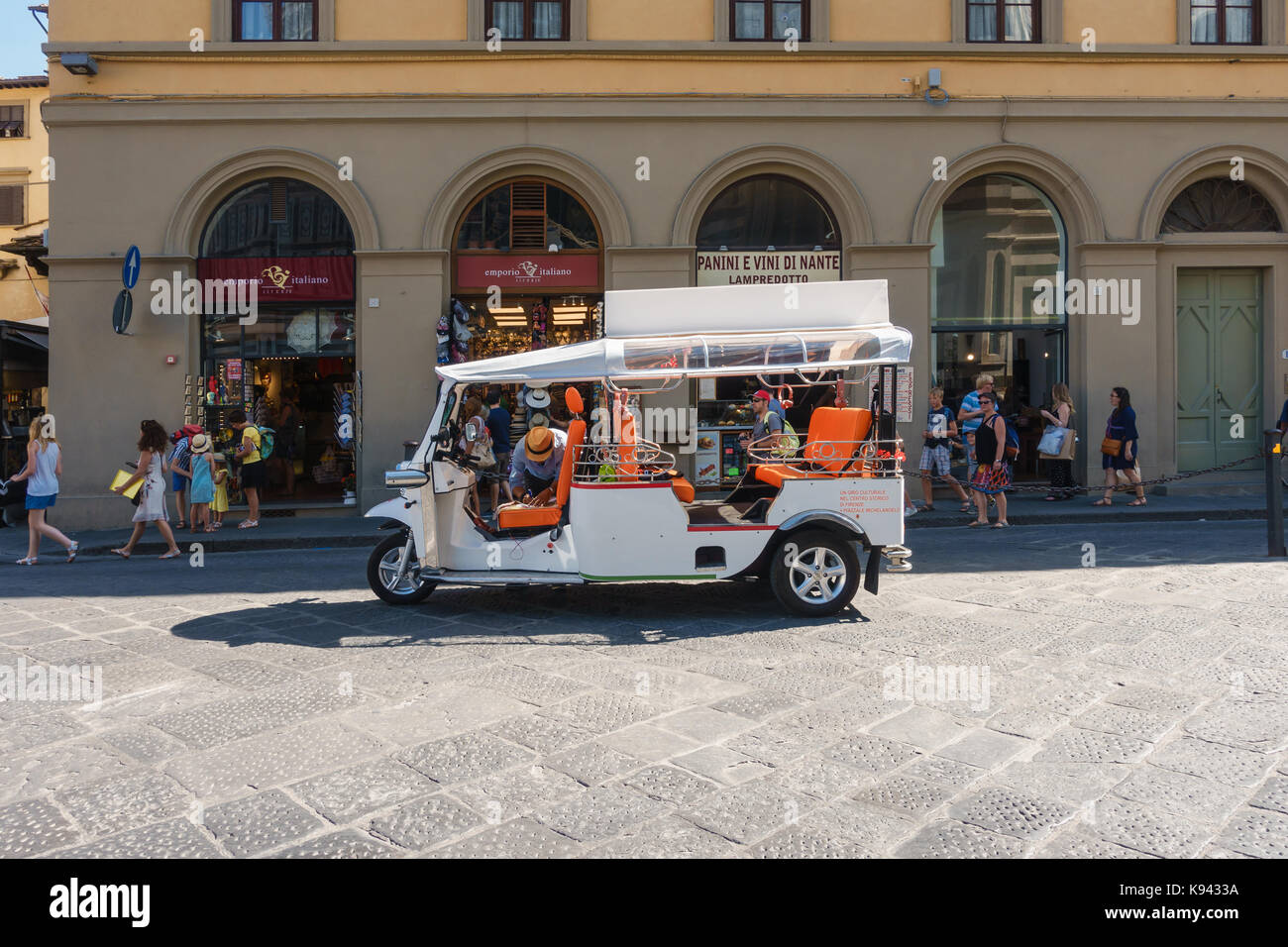 White tourist car in Florence, tourists at big Florence square Stock ...