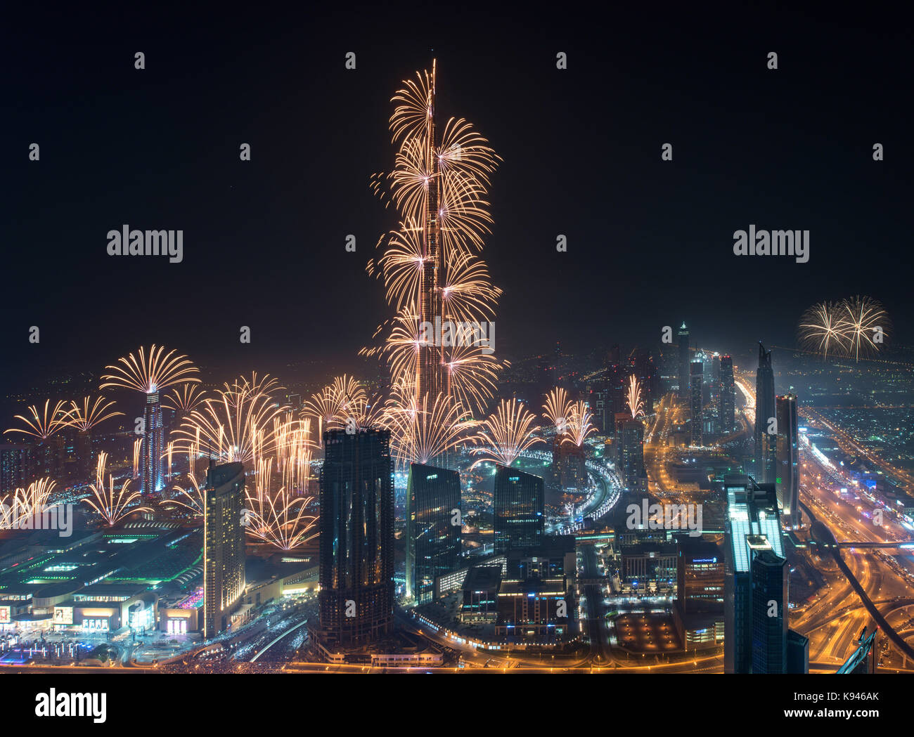 Cityscape of Dubai, United Arab Emirates at night, with fireworks and ...