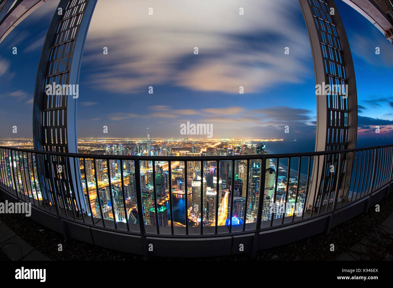 Fish-eye cityscape of Dubai, United Arab Emirates at dusk, with ...