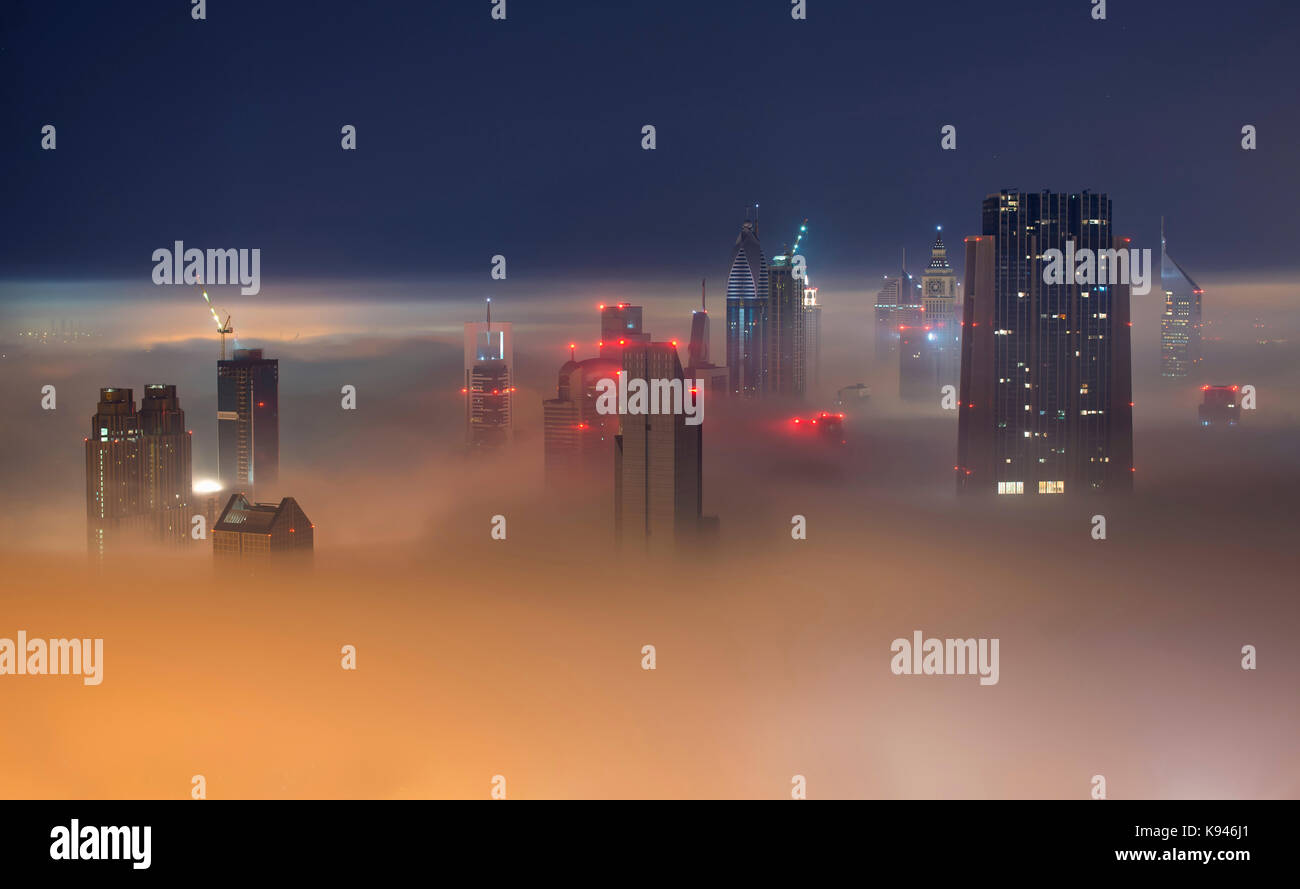Cityscape with view of skyscrapers above the clouds in Dubai, United ...