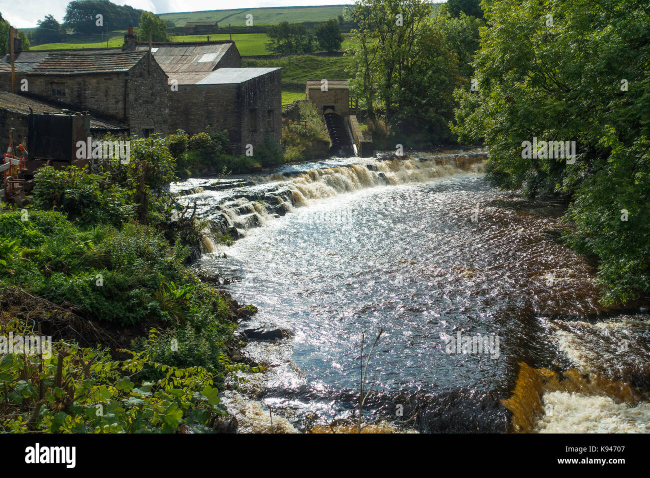 Early Morning Light Reflects on The River Bain at Bainbridge in the ...