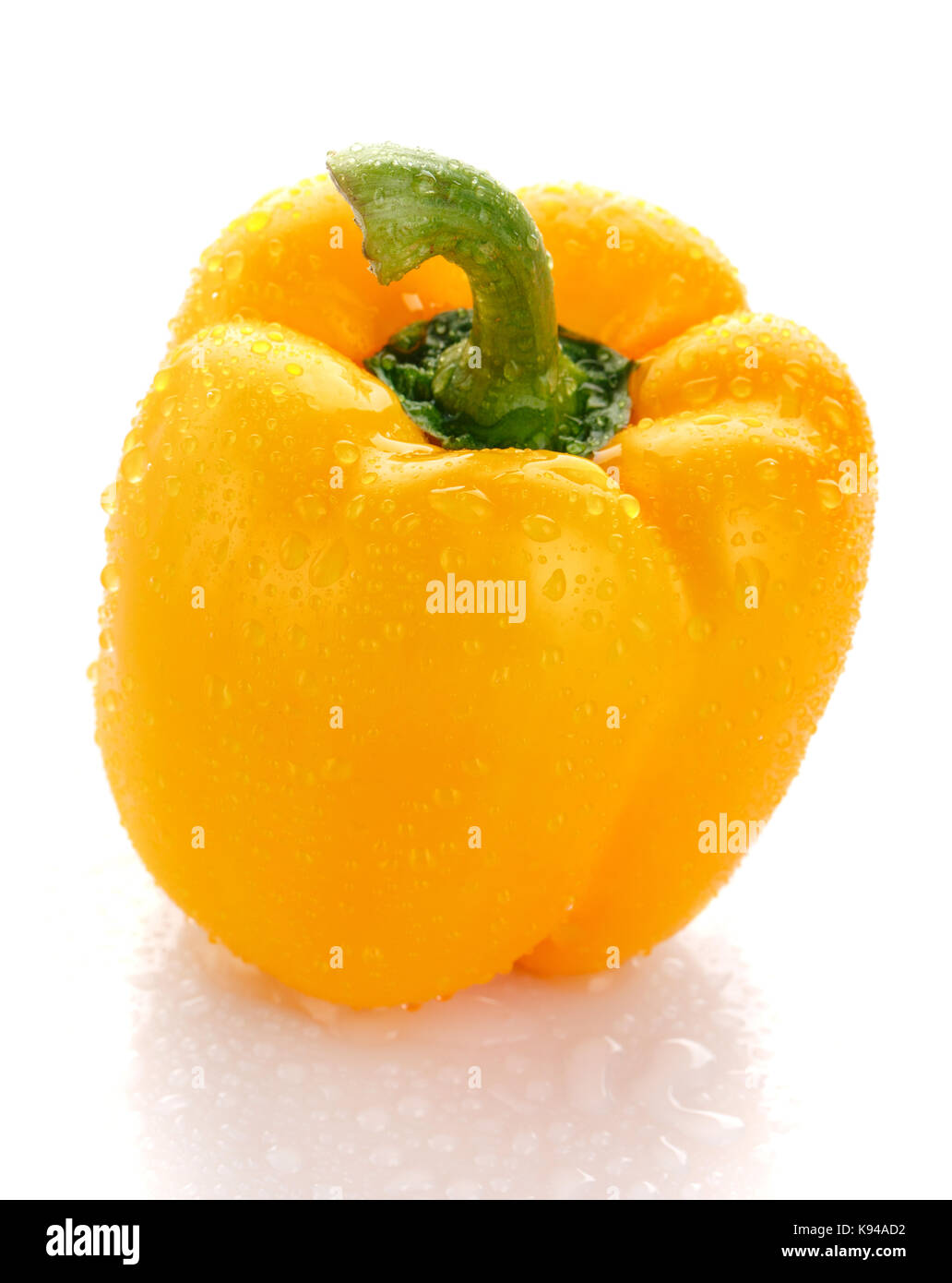Pepper, food, and vegetable concept - sweet yellow pepper with drops of ...