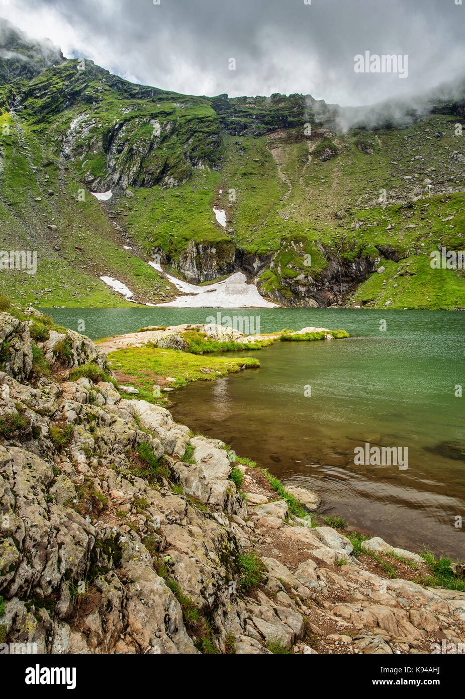 Mountain lake. The lake between the rocks. Hiking and Tourism Concept ...