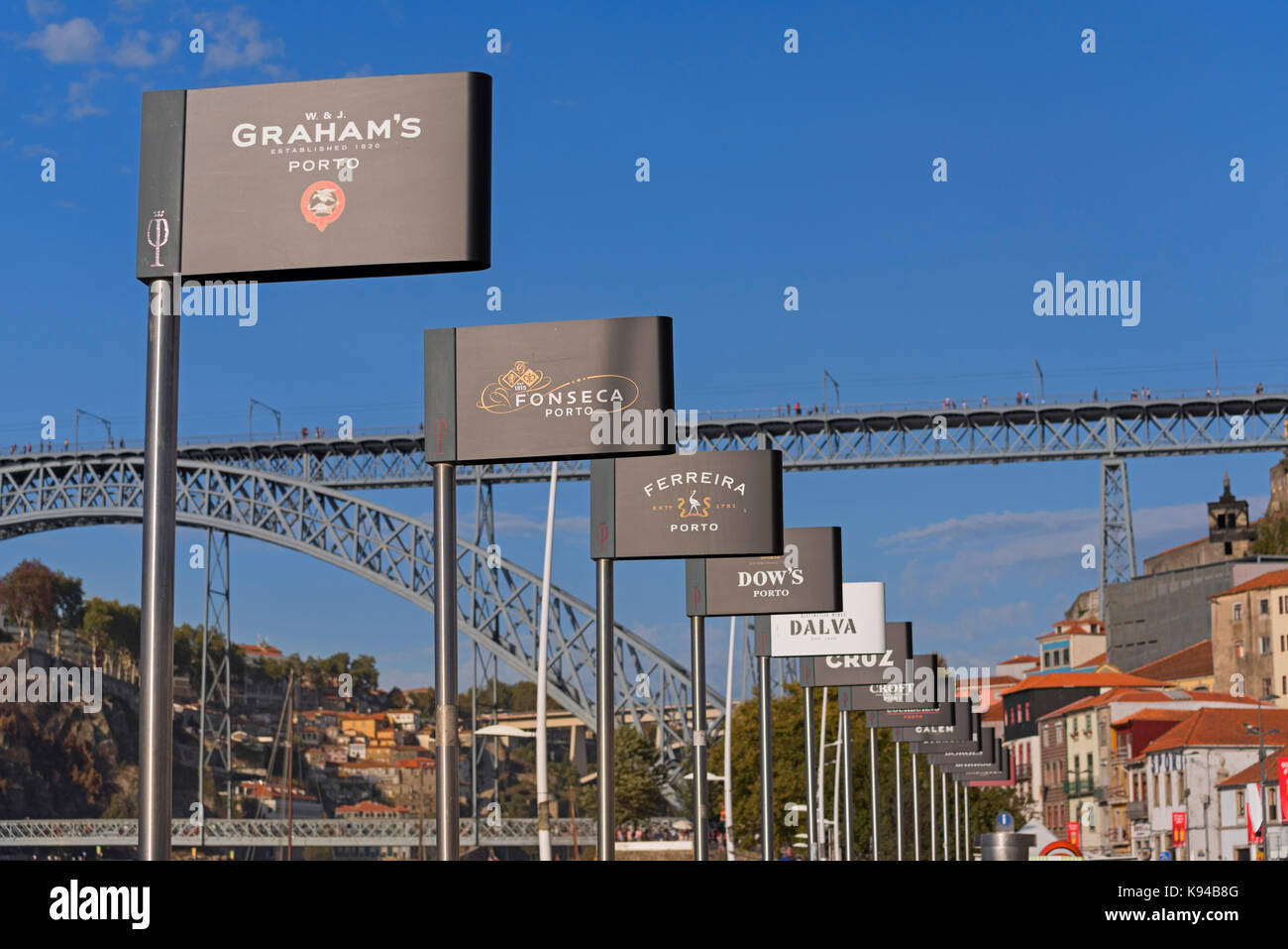 Port signs and Dom Luis I bridge Vila Nova de Gaia Porto Portugal Stock ...