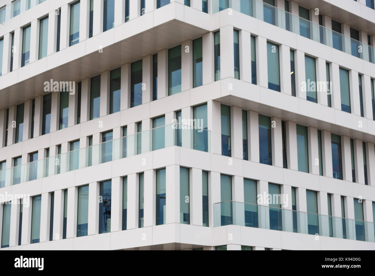 Texture of the modern facade. Perspective view of a white concrete ...
