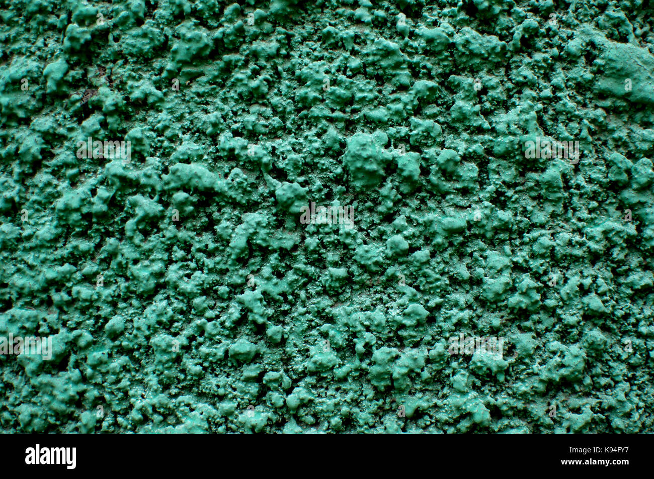 Texture of rough plastered green wall. Grungy color plaster wall ...